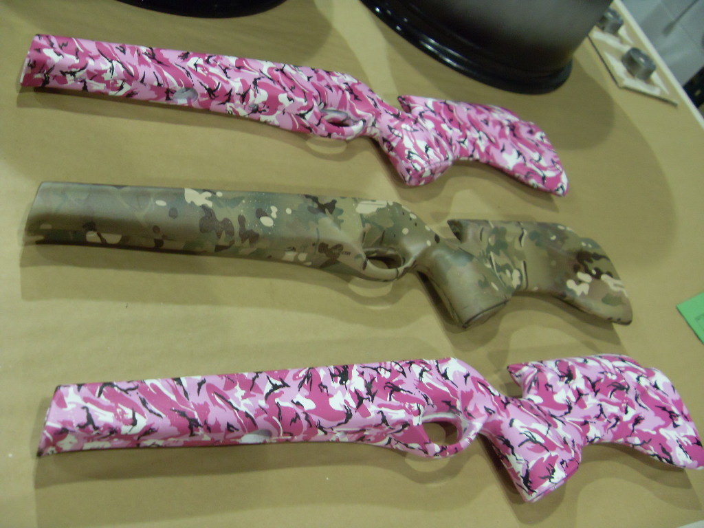 Pink camo and military camo guns
