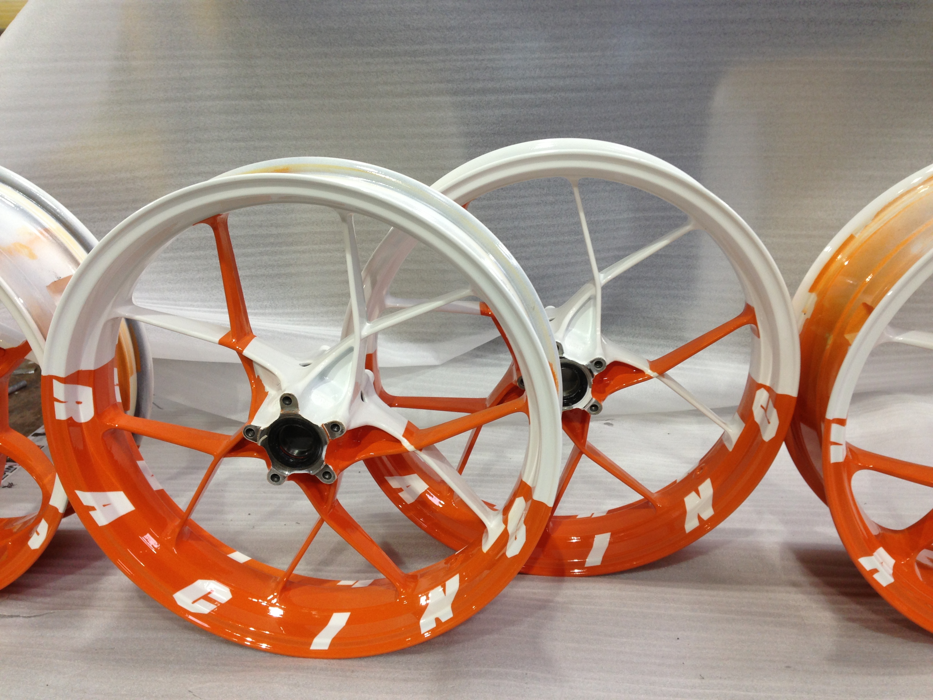 KTM Racing wheels painted white and orange