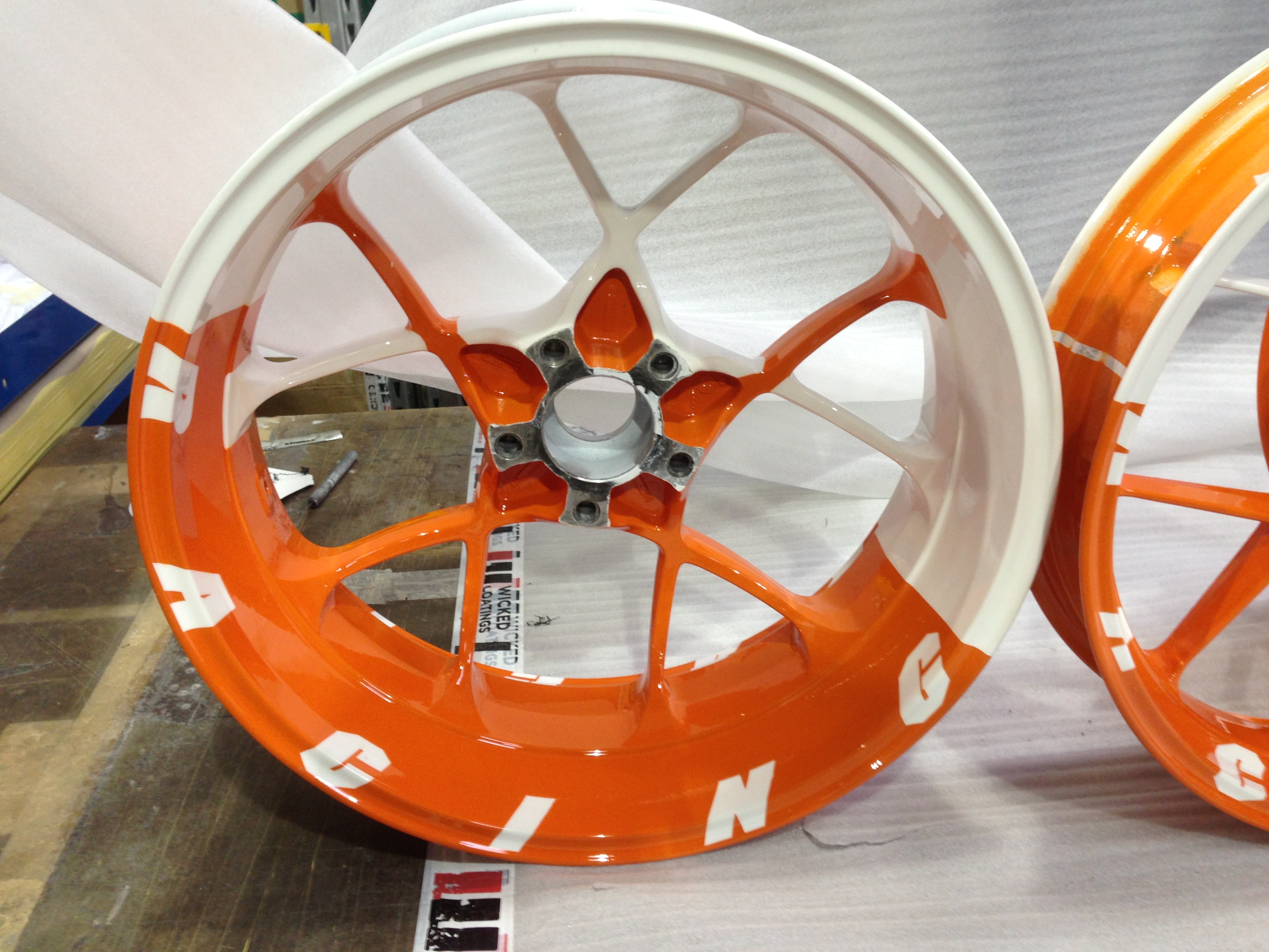 KTM Racing wheels painted white and orange