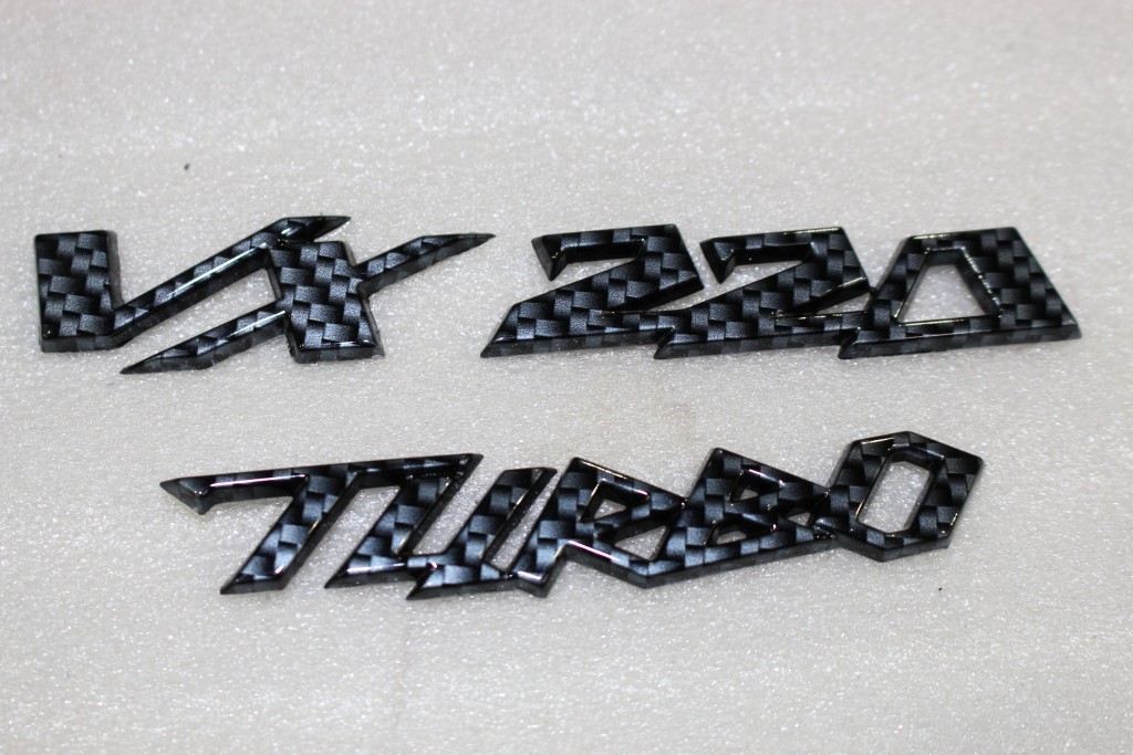 Wicked Coatings | Vauxhall VX 220 Turbo badge coated in carbon fibre