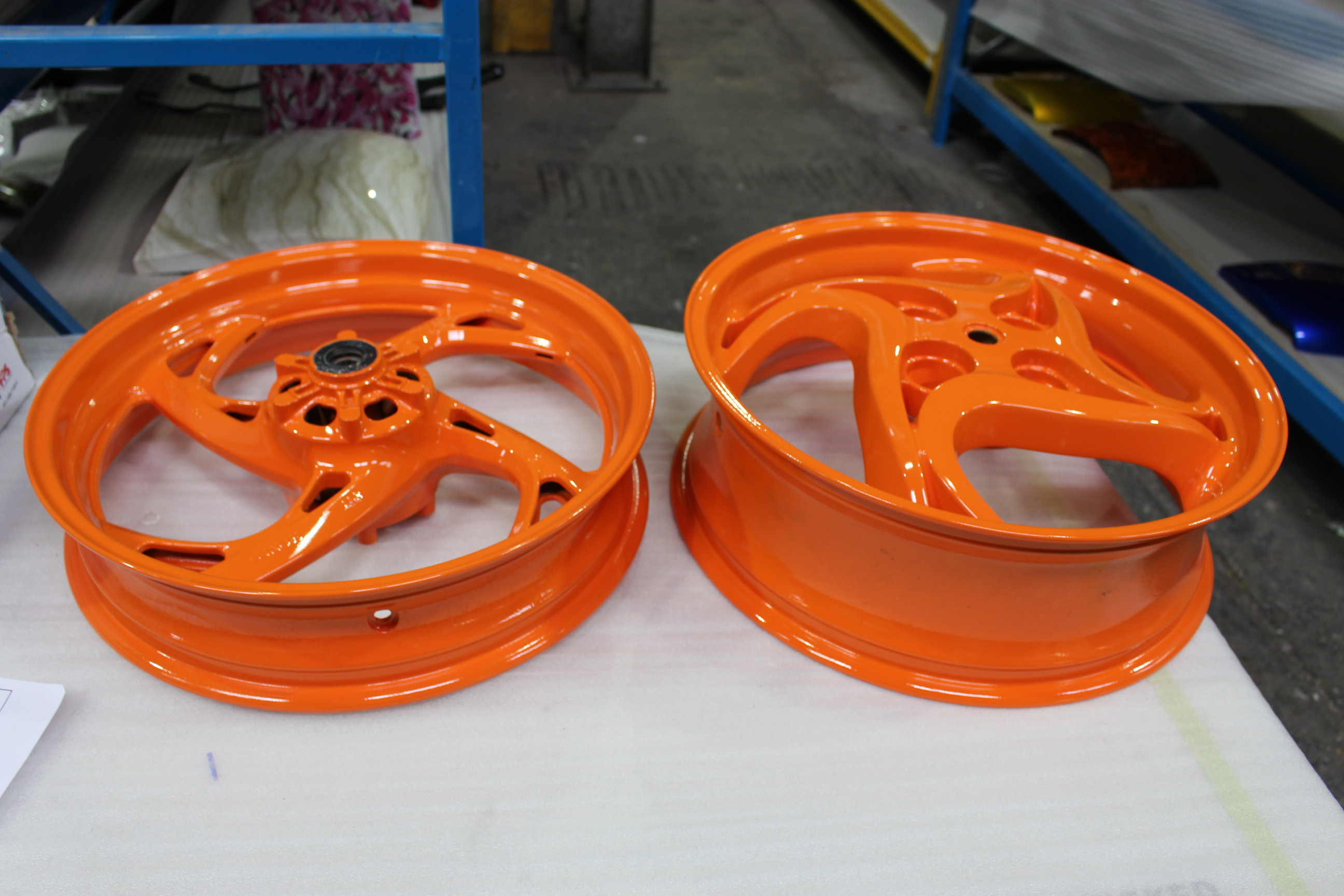Motorbike alloy wheels painted orange